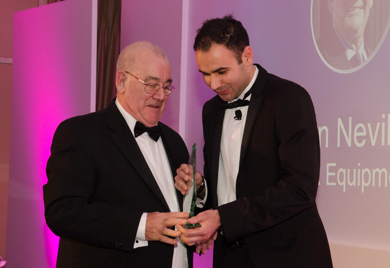 Industry executives upstanding for CHR's Ron Neville