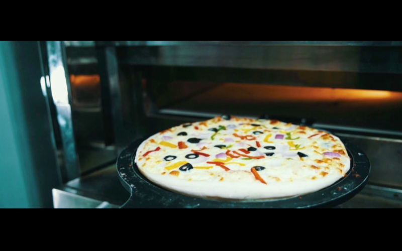 Maker of fully robotic pizza systems says model allows kitchens to add ...