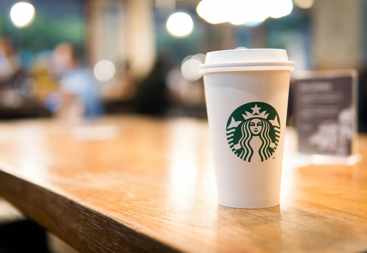 How many coffee machines does Starbucks need to serve its busiest UK site?